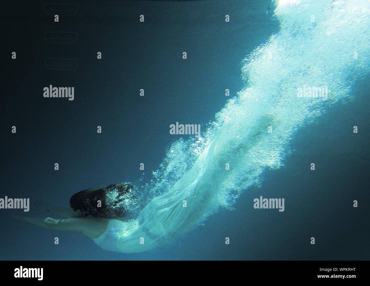 Woman swimming sea waves hi-res stock photography and images - Alamy