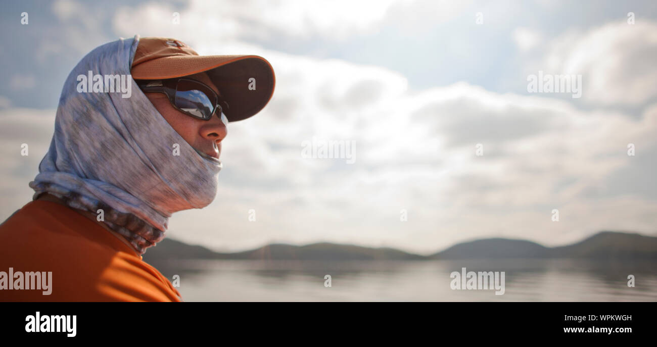 Wearing a baseball cap sunglasses hi-res stock photography and images ...