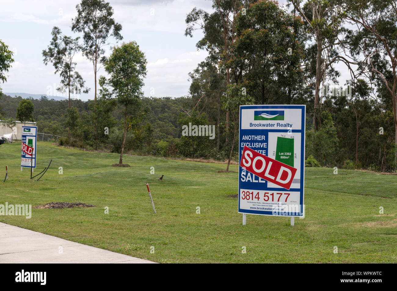 A plot of land sold for a home to be built in a residential area of the ...