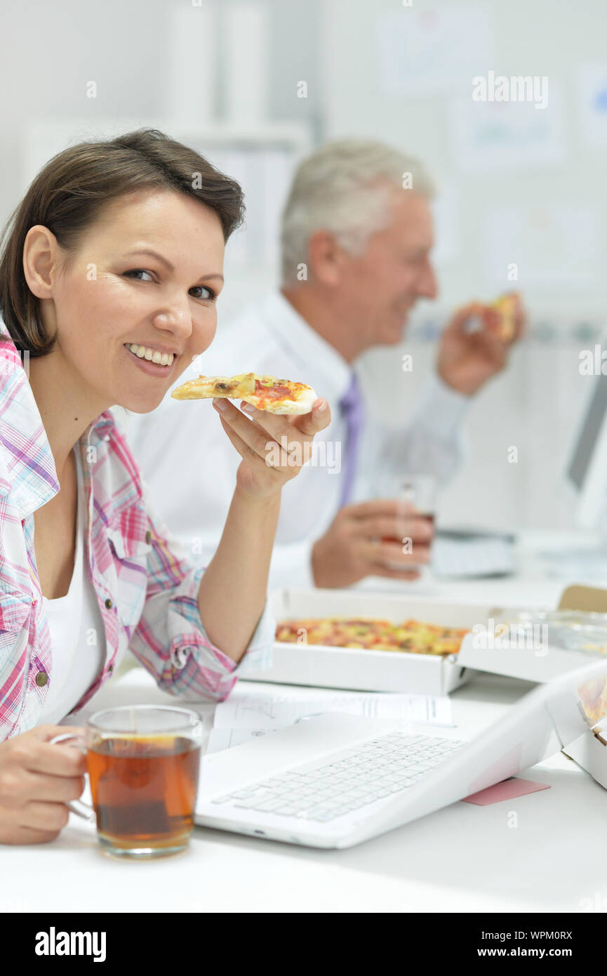 Portrait of business people having lunch together Stock Photo - Alamy