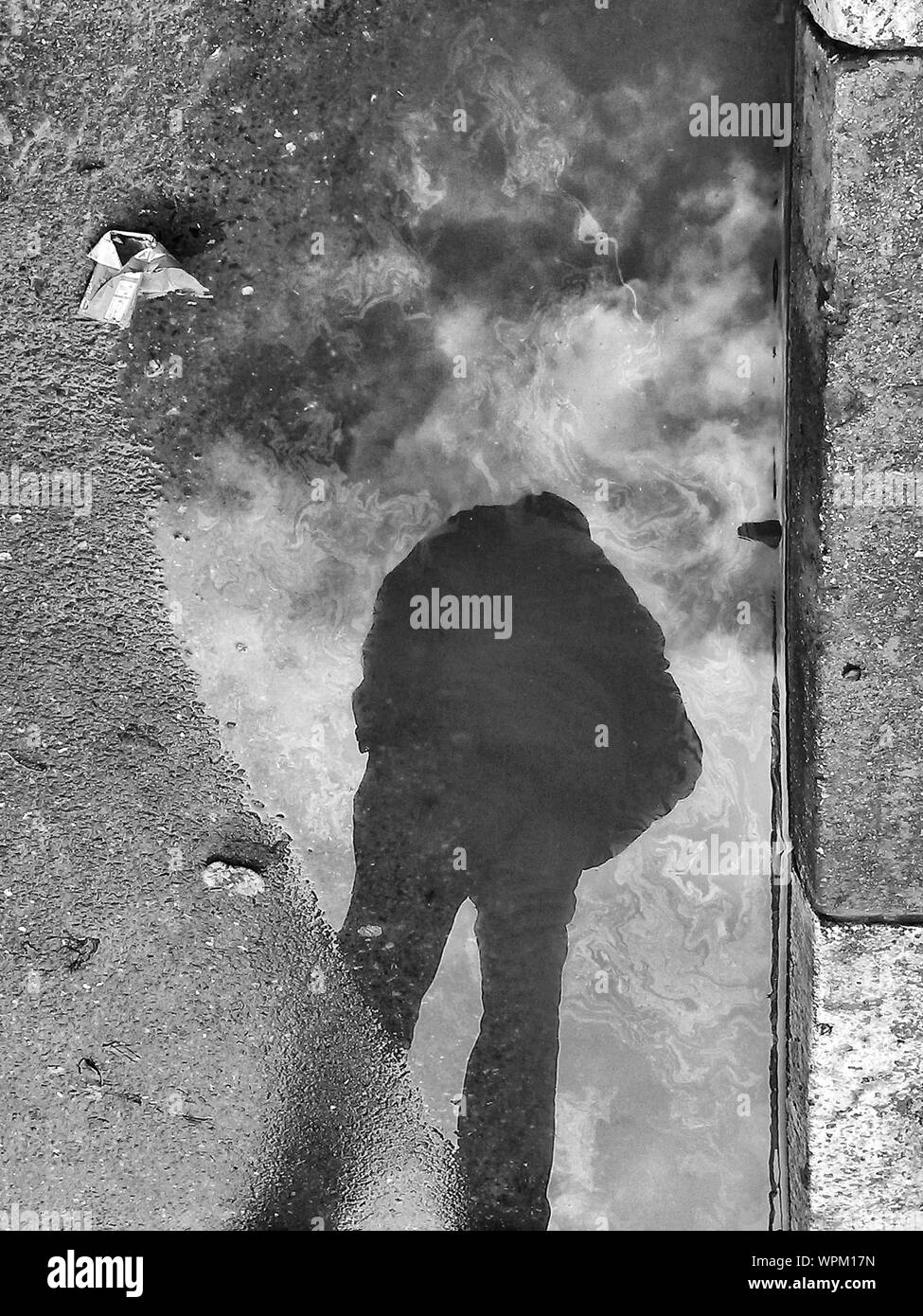 Man Puddle Water High Resolution Stock Photography and Images - Alamy