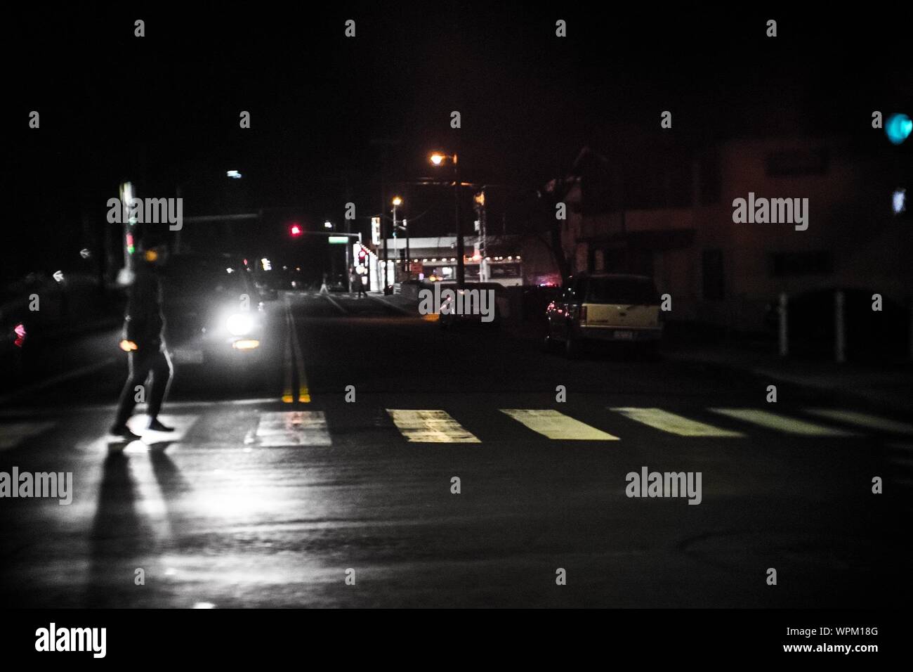 Person crossing car hi-res stock photography and images - Alamy
