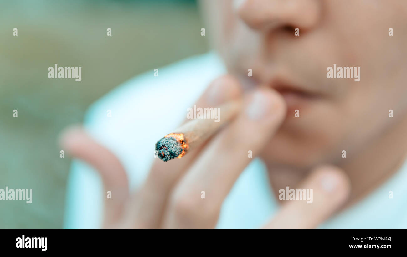 Man smoking joint hi-res stock photography and images - Alamy