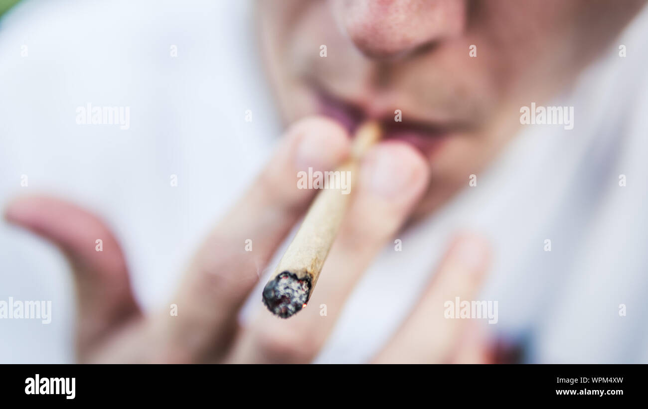 Guy Smoking Weed High Resolution Stock Photography and Images - Alamy