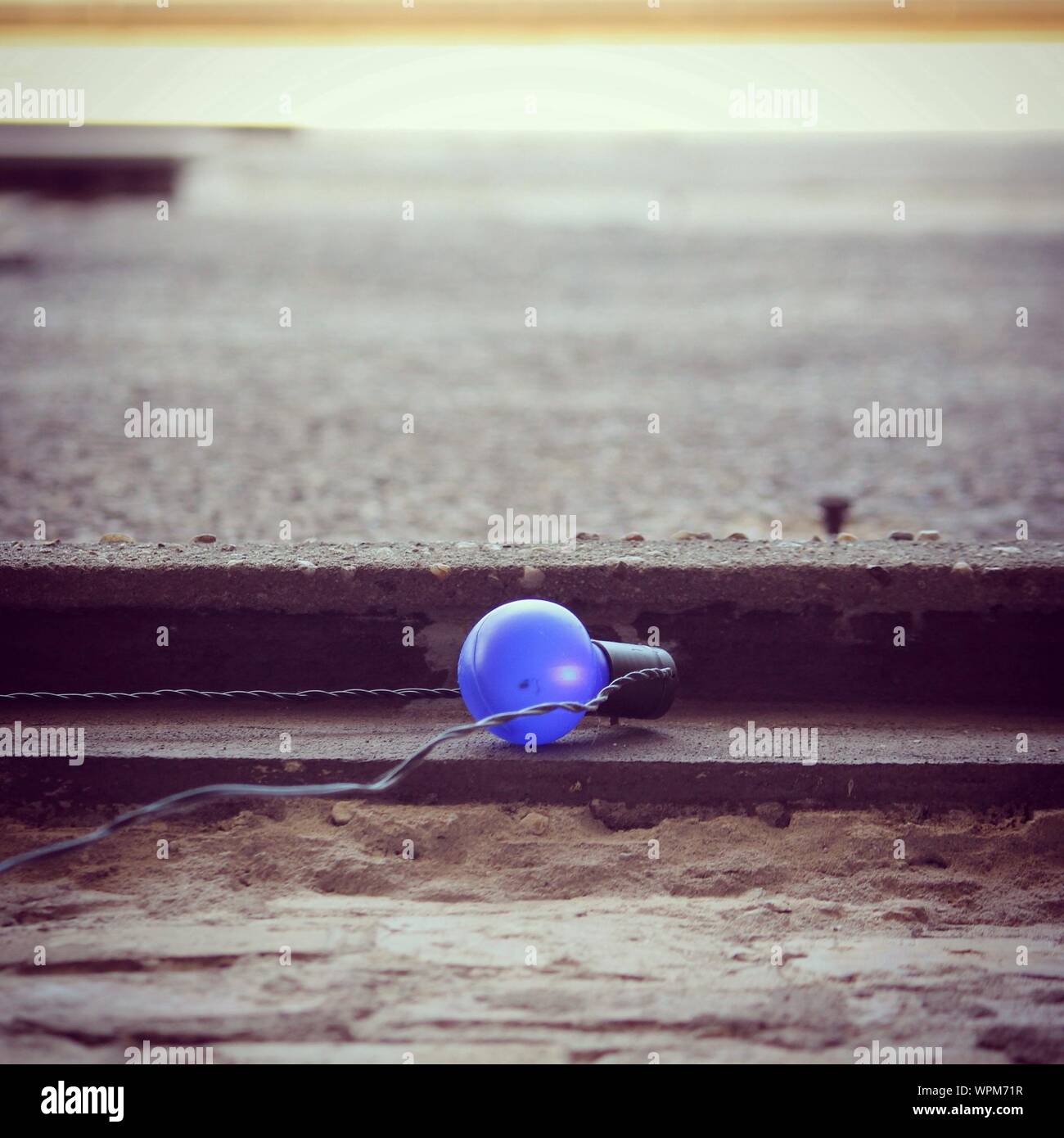 Blue Light Bulb Stock Photo - Alamy