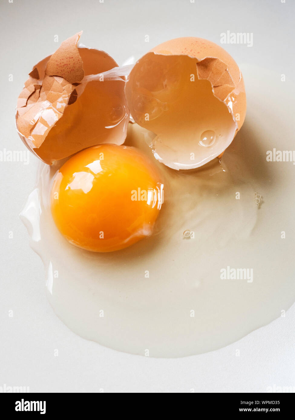 Broken egg yolk spilled hi-res stock photography and images - Alamy
