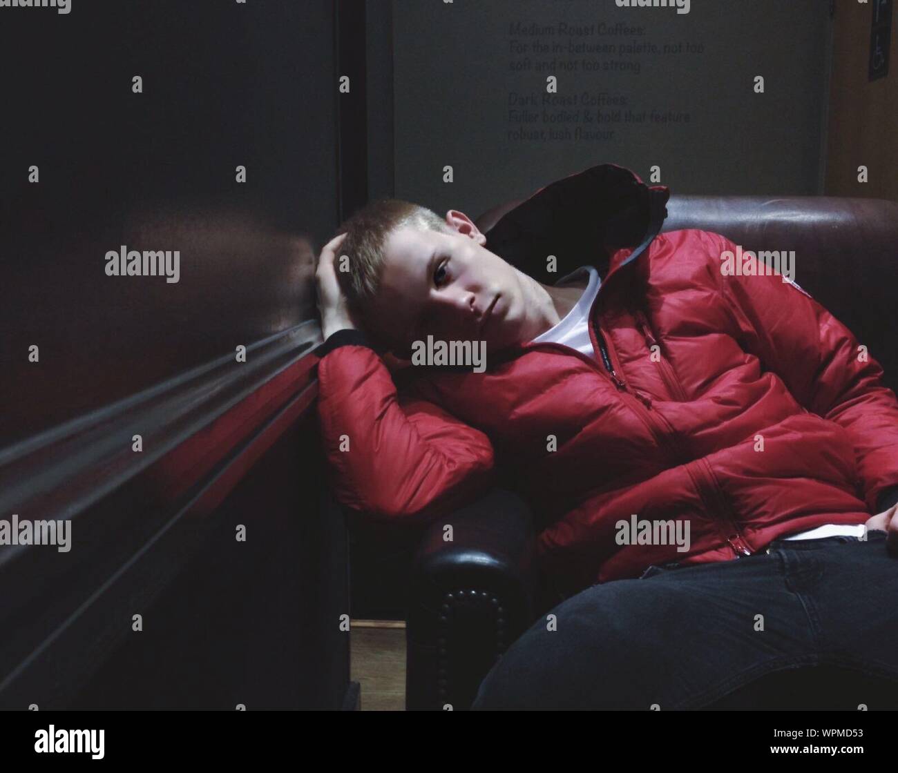 Sitting bored people hi-res stock photography and images - Alamy