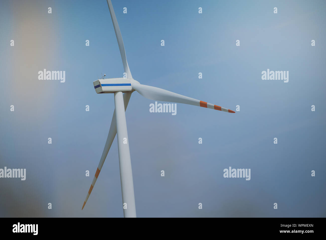 wind trubine at sunny day with blue sky Stock Photo - Alamy