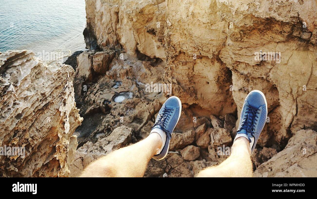 Man cliff leg hi-res stock photography and images - Alamy