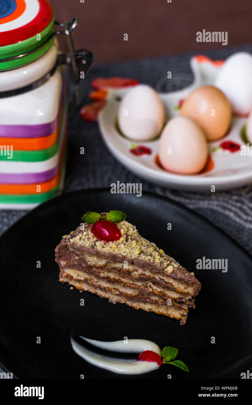 Delicious Portuguese Bolo Sans Rival cake sliced and served Stock Photo ...
