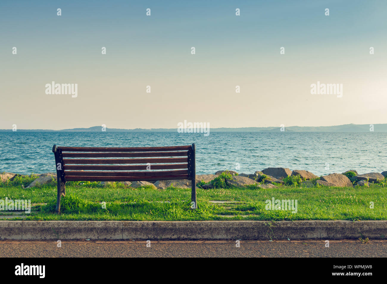 Lonely bench sunset hi-res stock photography and images - Alamy