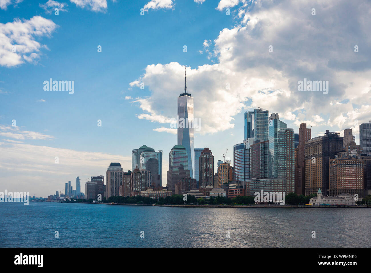 Lower Manhattan NYC, view across New York harbor of the financial ...