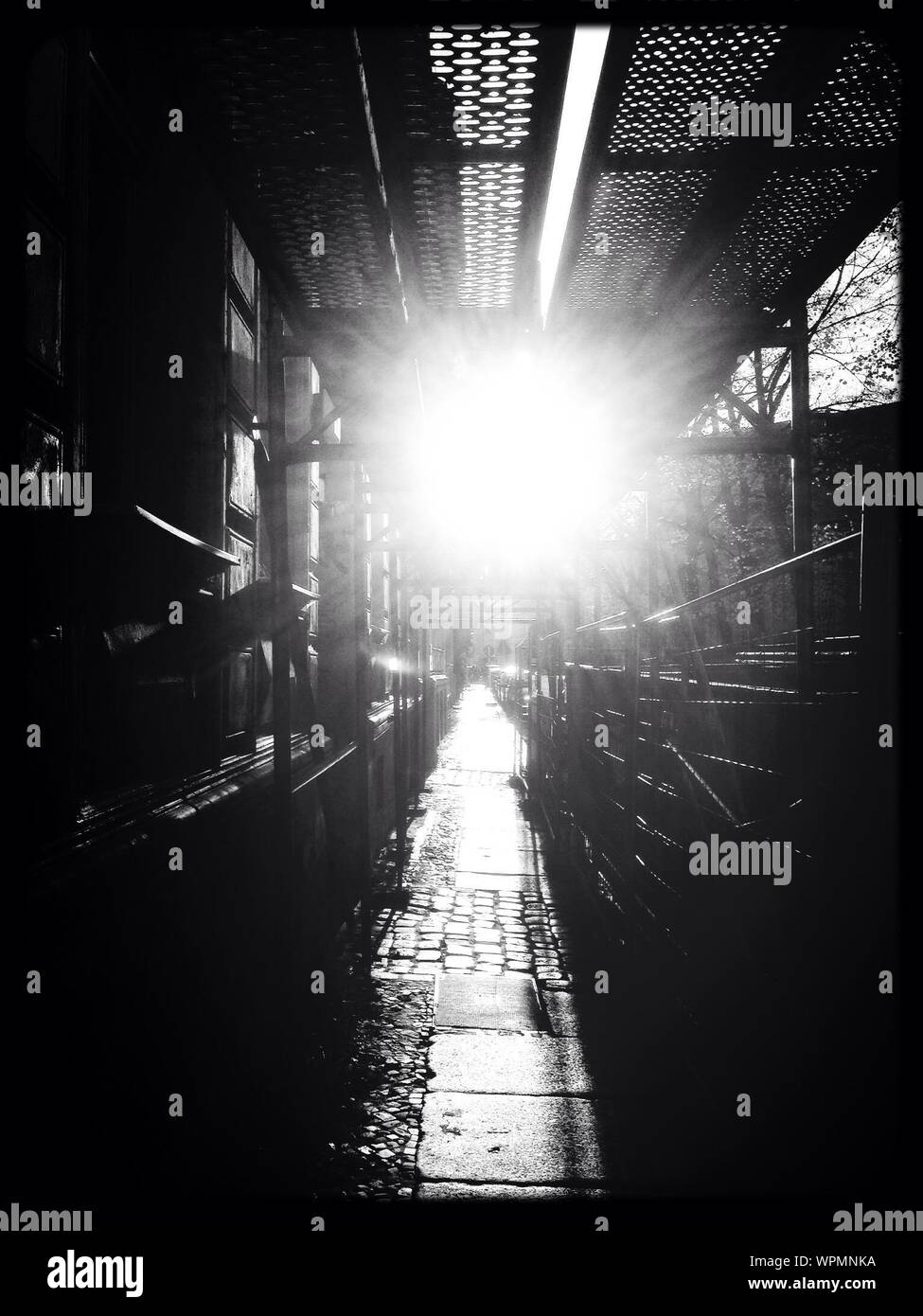 Factory Walkway In Sunlight Stock Photo - Alamy