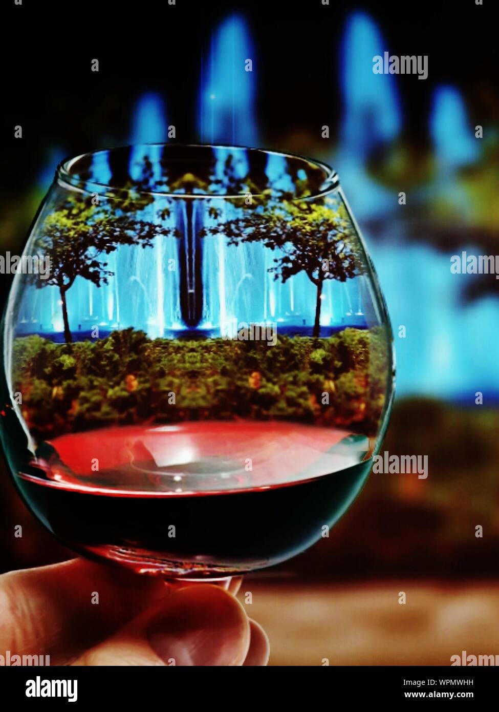 Hand through wine hi-res stock photography and images - Alamy