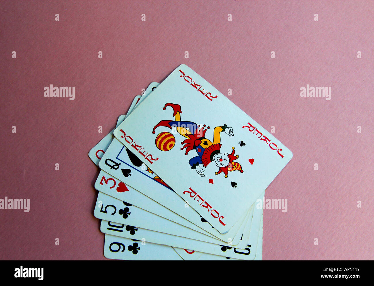 Cards for poker on pink background. Poker play. Place for text Stock ...