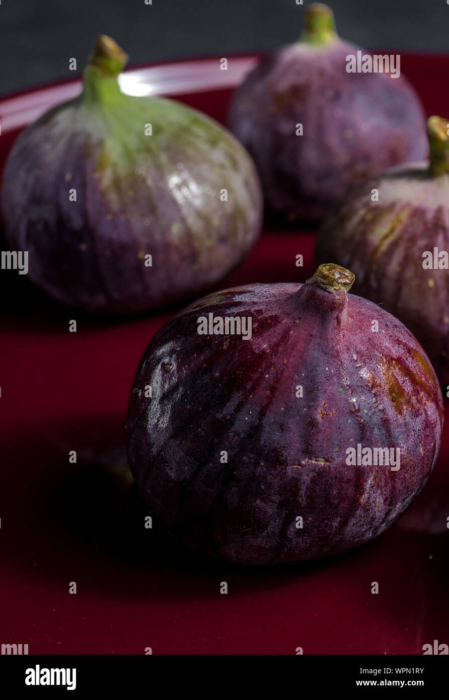 fresh figs close-up photo on dark background. dark moody photo Stock ...