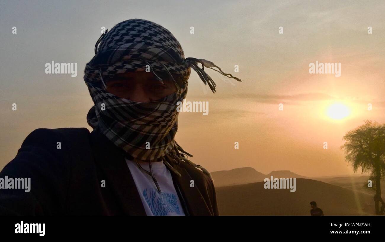 Man covered in sand hi-res stock photography and images - Alamy