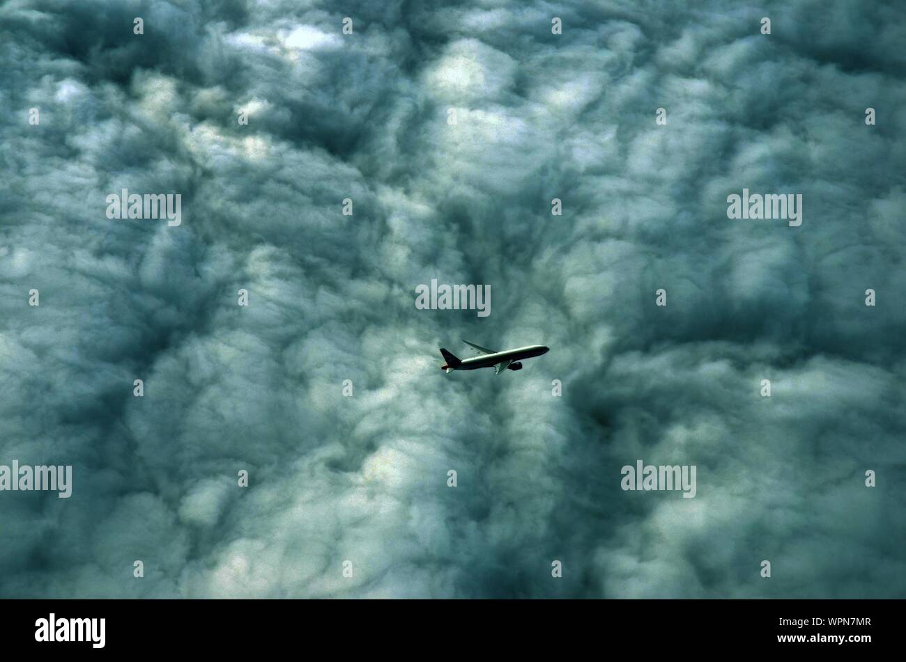 Airplane storm clouds hi-res stock photography and images - Alamy