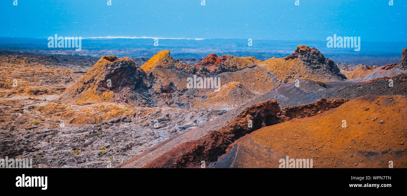 Volcanic landscape and volcano crater at Timanfaya National Park ...