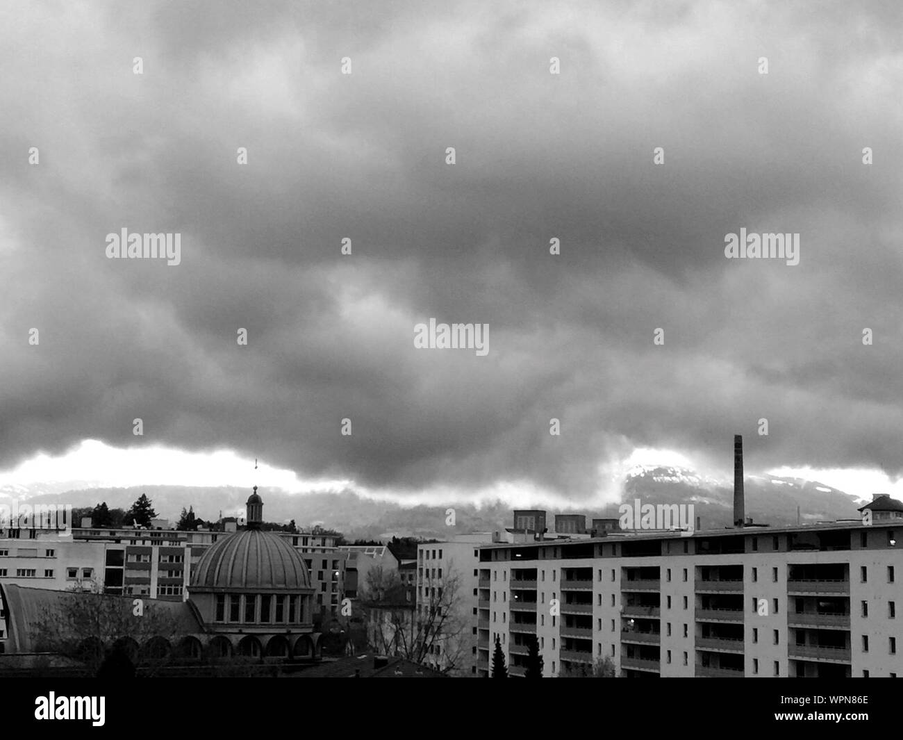 Buildings Under Stormy Cloud Stock Photo - Alamy