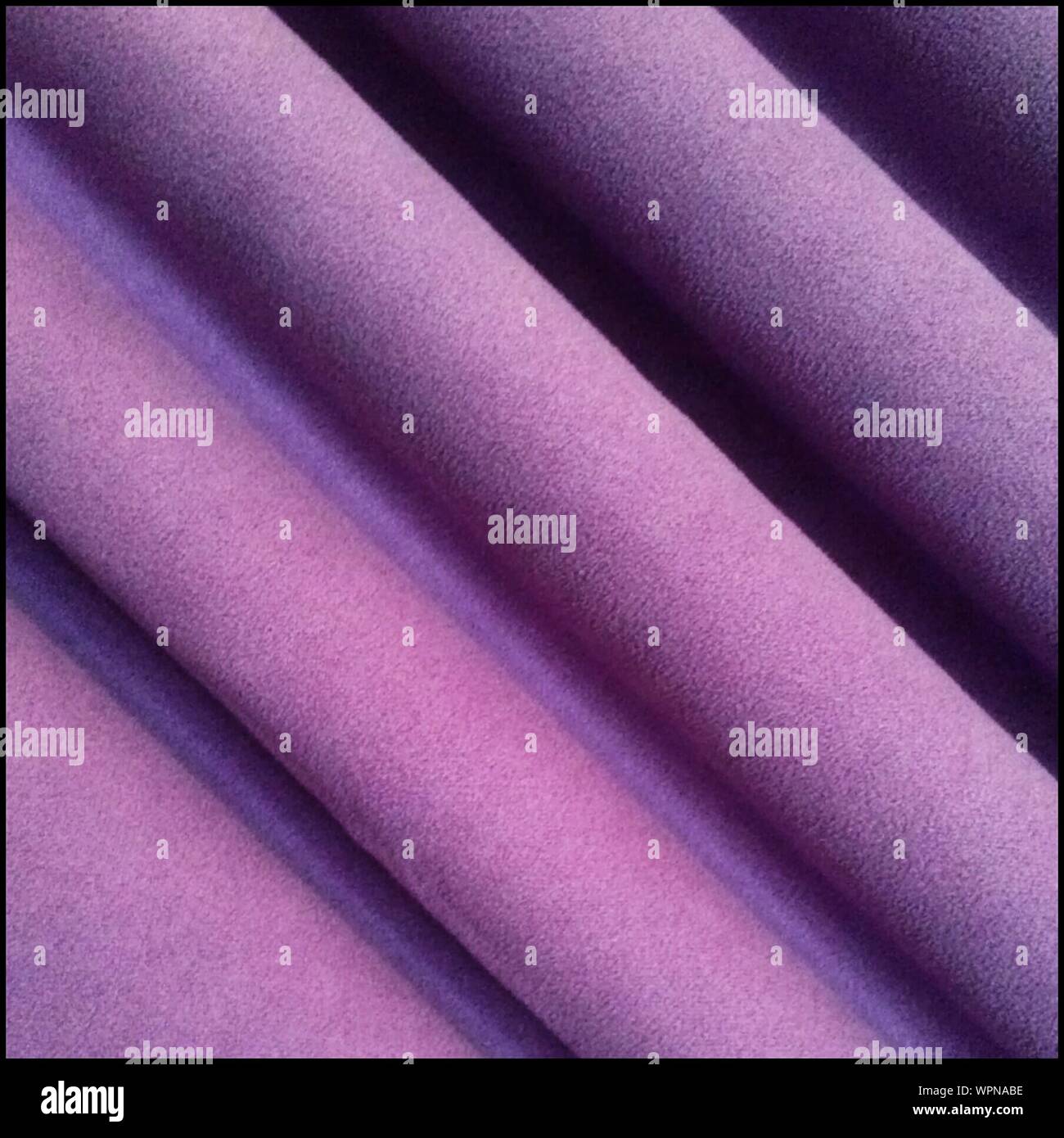 Purple fabrics hi-res stock photography and images - Alamy