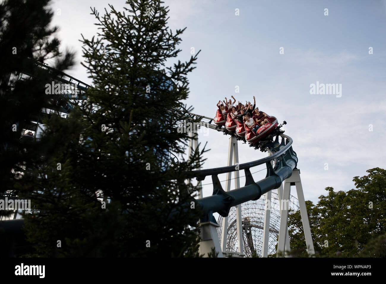 Riders enjoy a curve on the Euro-Mir roller coaster at Europa-Park in ...