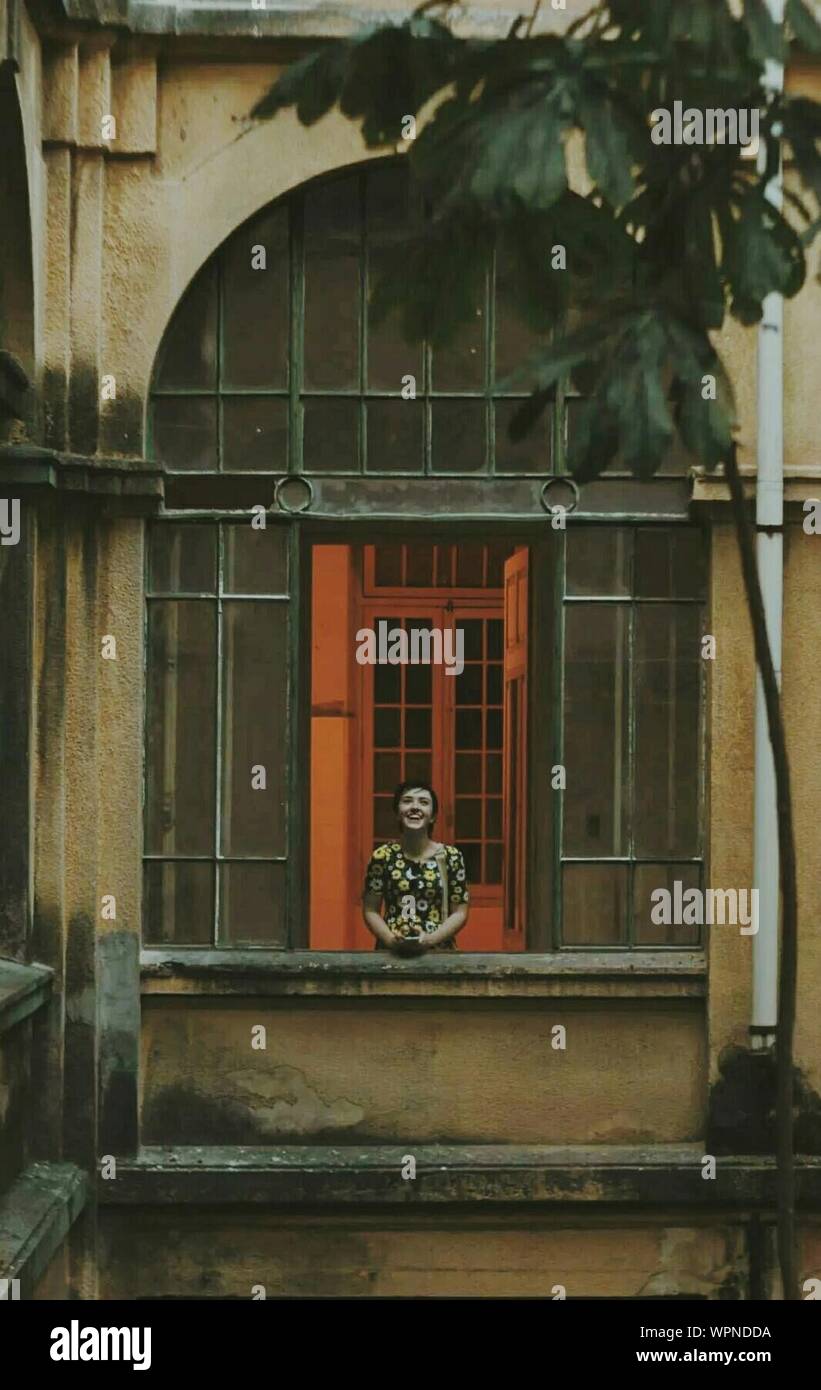 Standing in window hi-res stock photography and images - Alamy