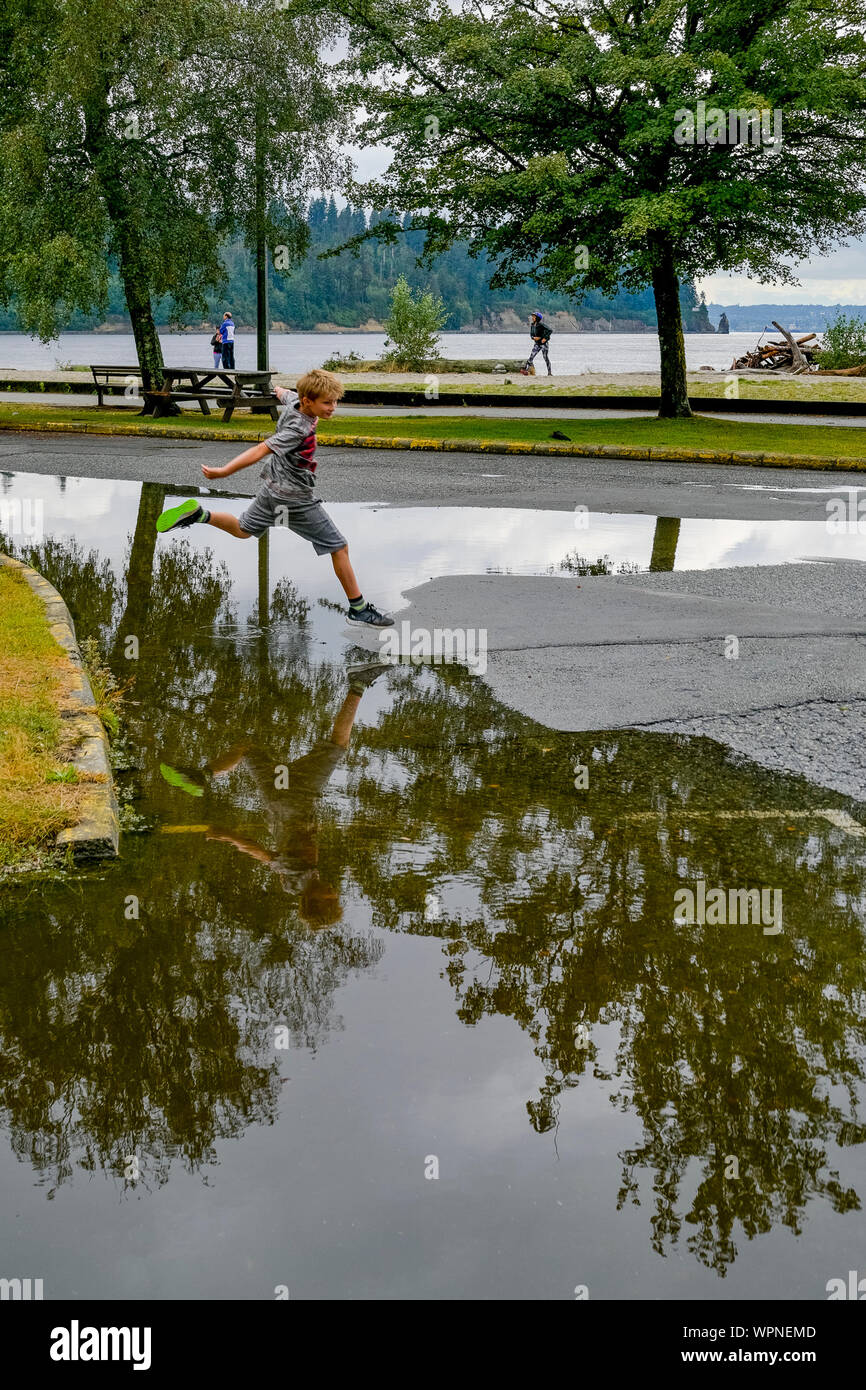 Over puddle hi-res stock photography and images - Alamy