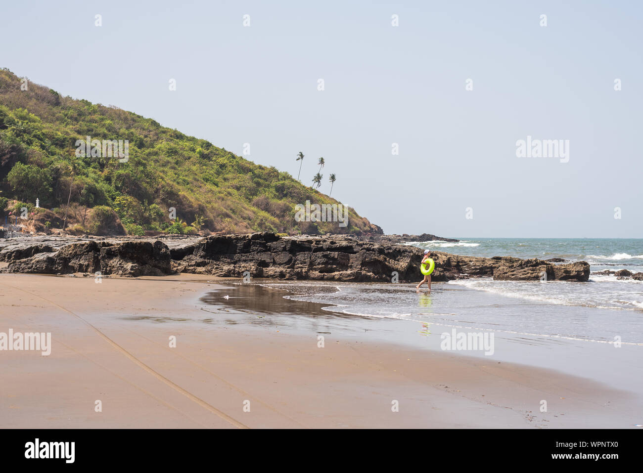 Ozran or Little Vagator Beach, Goa/India- April 21 2018: Tourists and ...