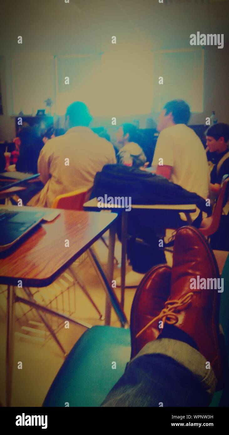 Rear View Of People In Classroom Stock Photo - Alamy