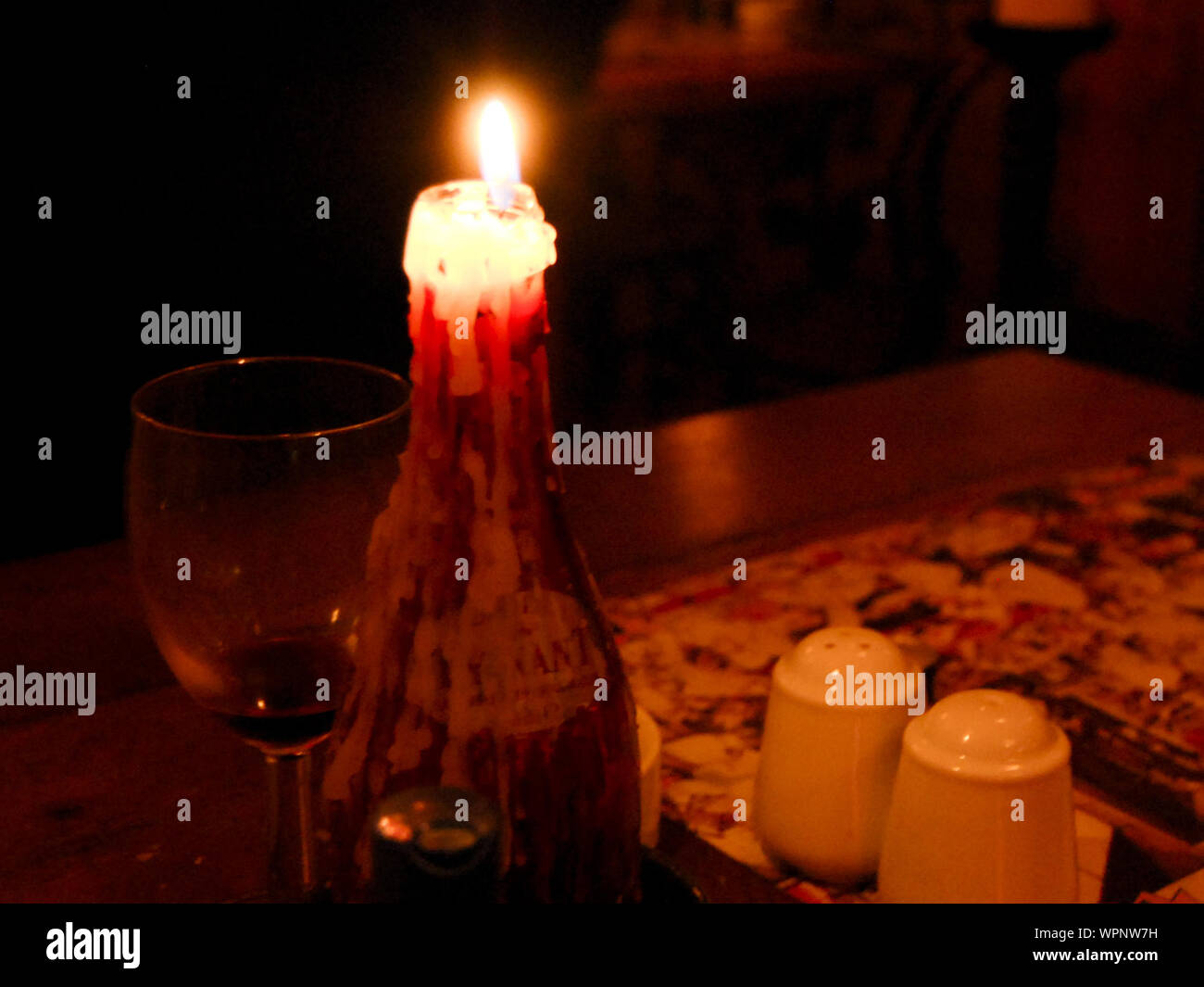 Burning candle on restaurant table hi-res stock photography and images ...