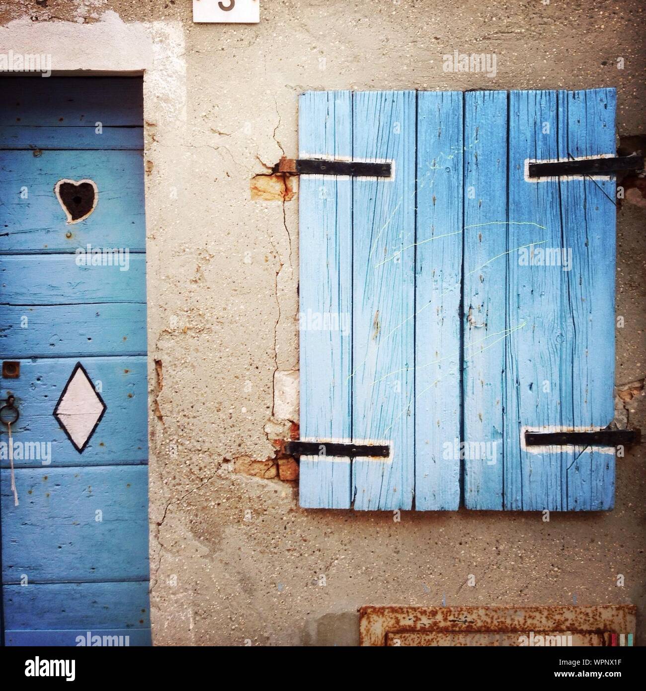 Wooden blue window hi-res stock photography and images - Alamy