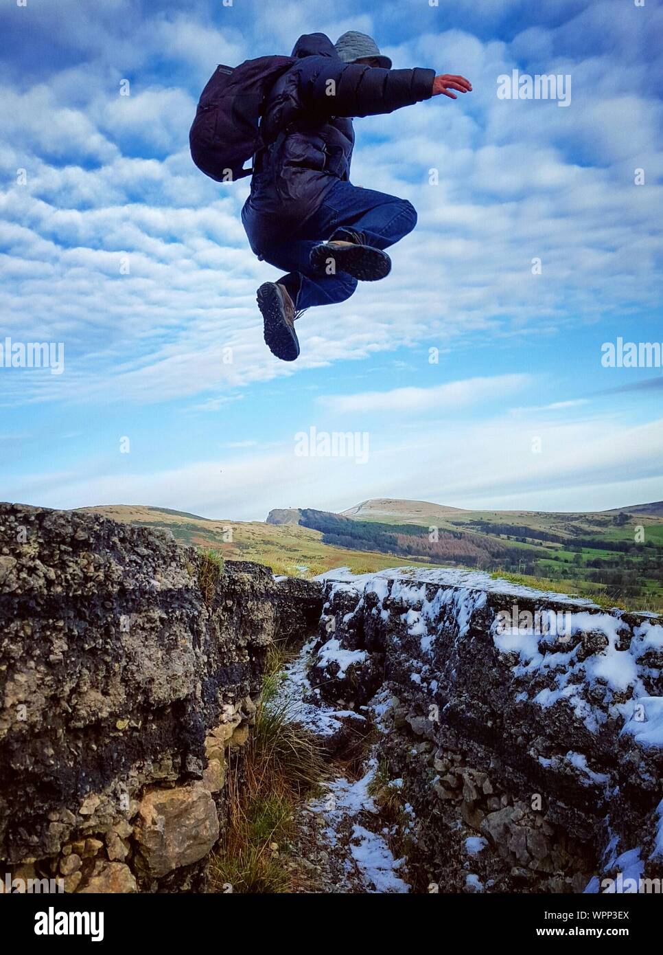 Jumping over rocks hi-res stock photography and images - Alamy