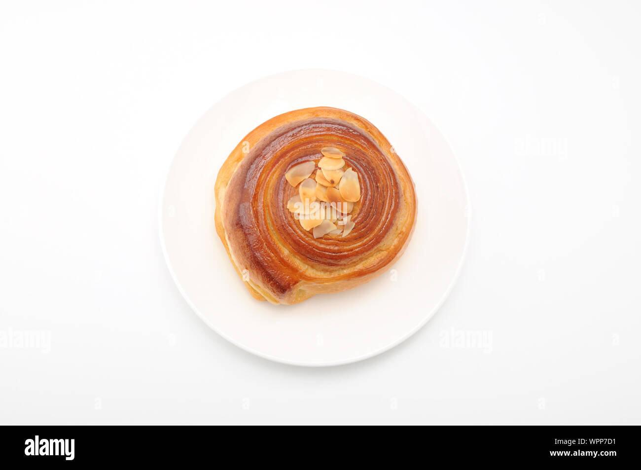 almond round bread closeup isolated on white background Stock Photo - Alamy