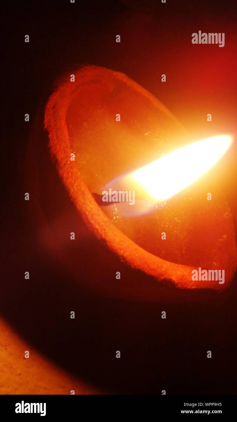 Single lit diya hi-res stock photography and images - Alamy
