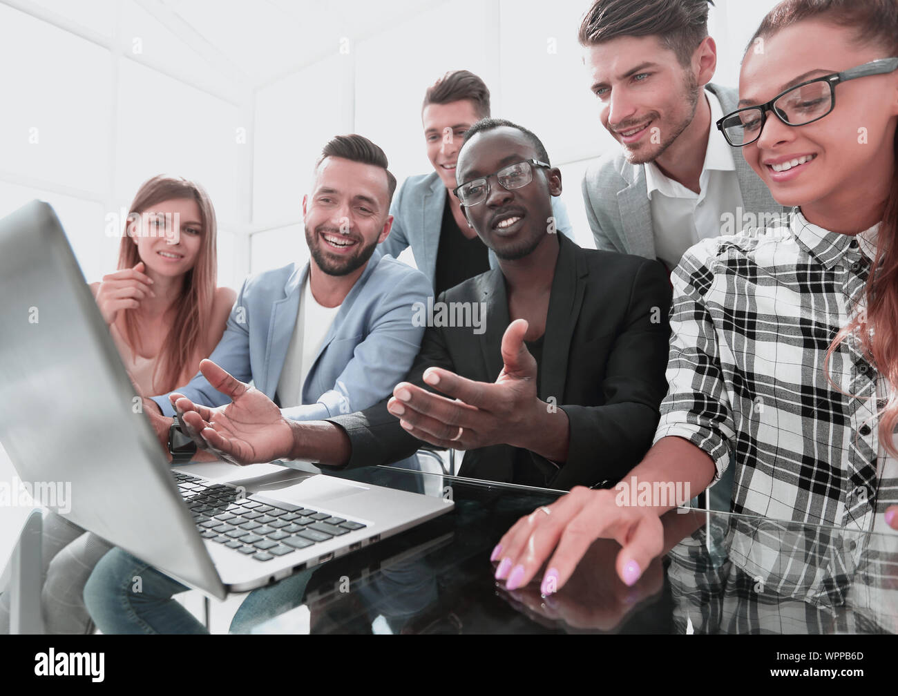 economists looking at screen of laptop, computer with wondered amazed ...