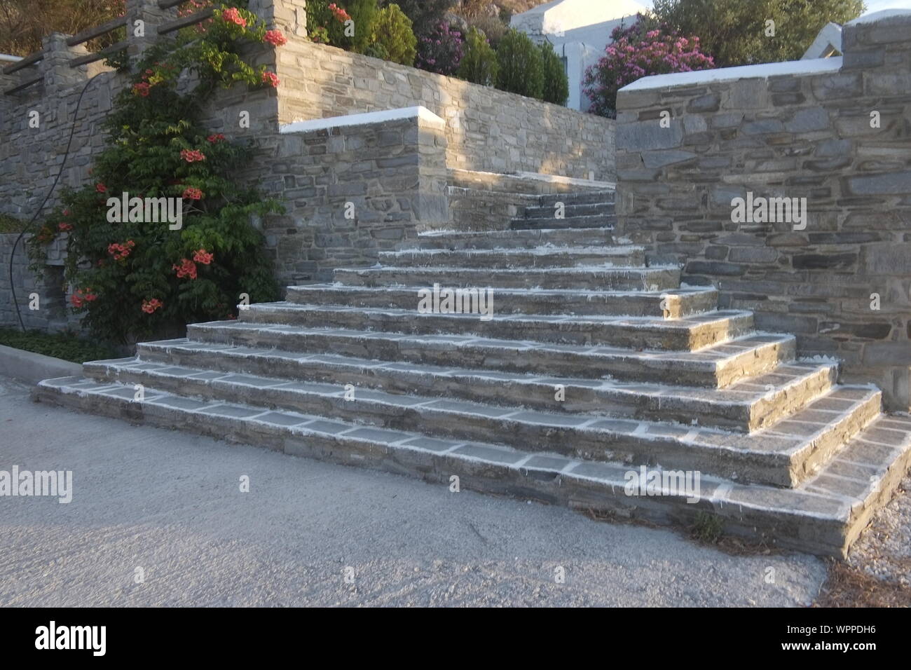 Curved white stairs of a greek traditional house hi-res stock ...