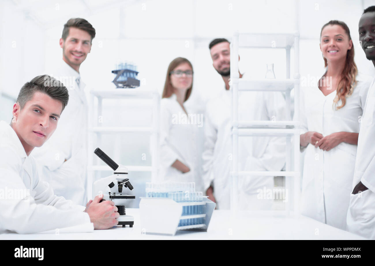 Team In Laboratory Doing Research, Man And Woman Making Scientific ...