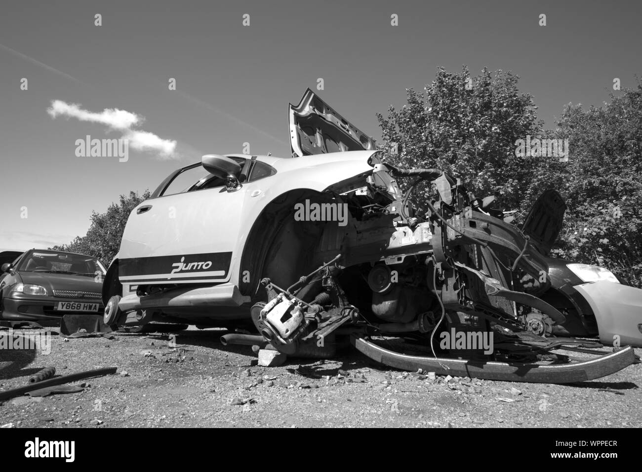 Smashed and wrecked car in a scrap yard Stock Photo - Alamy