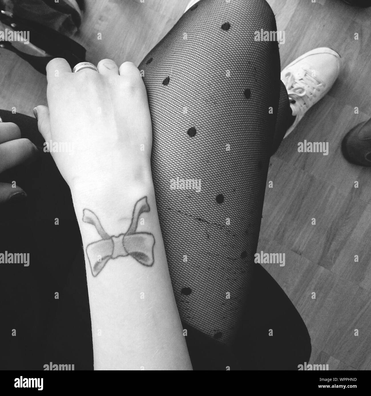 Tattoo Woman Sitting Legs Crossed High Resolution Stock Photography and ...