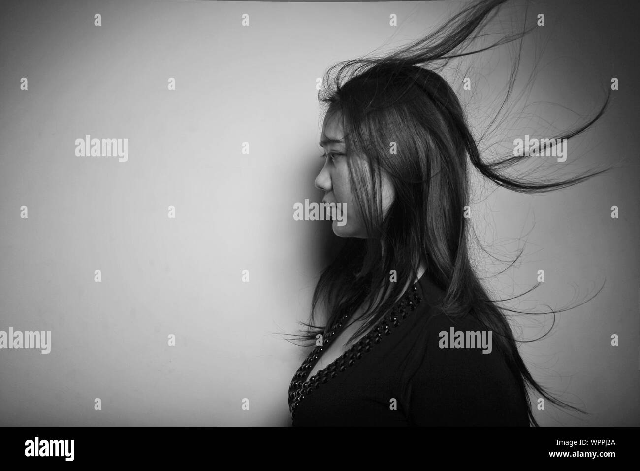 Windswept person Black and White Stock Photos & Images - Alamy