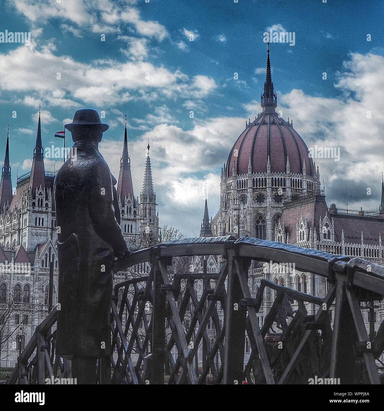 Old man looking at statue hi-res stock photography and images - Alamy