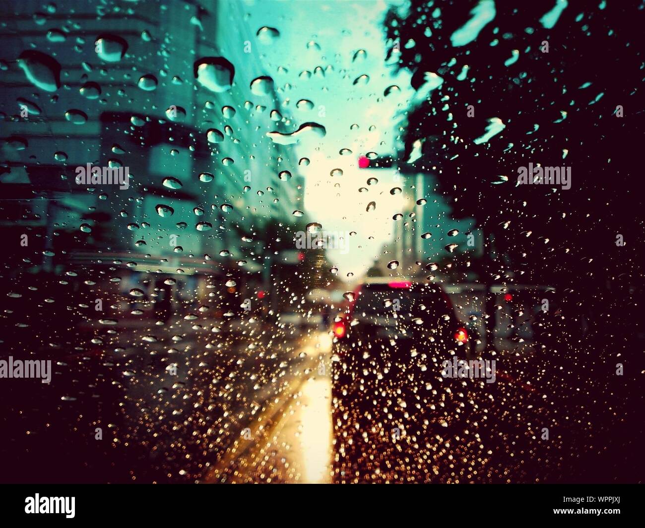 Car traffic as seen through wet window car hi-res stock photography and ...