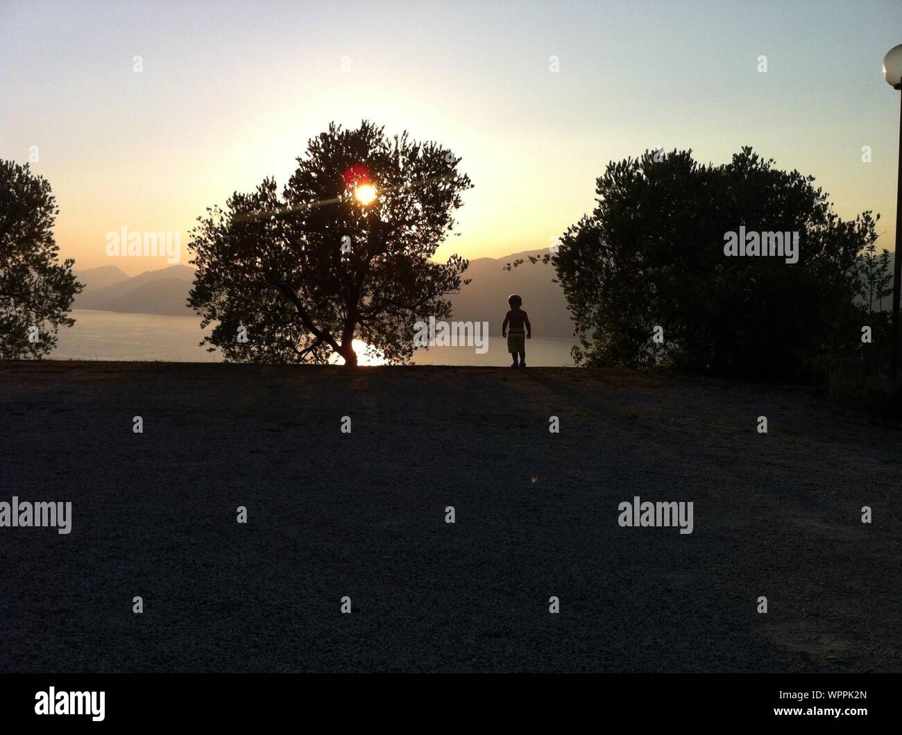 Looking sunset hi-res stock photography and images - Alamy