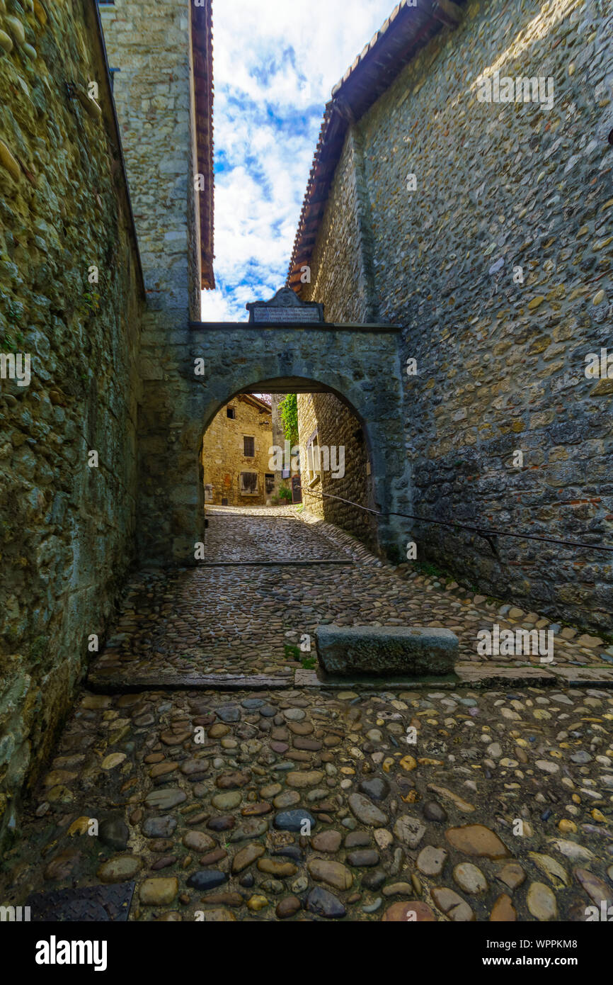 View of an alley in the medieval village Perouges, Ain department ...