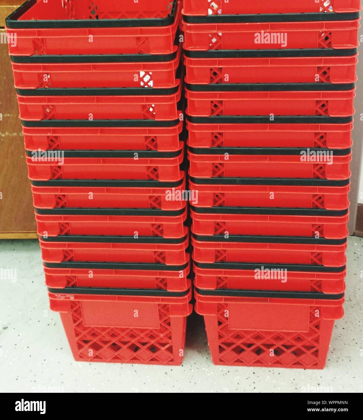 Stack of baskets in supermarket High Resolution Stock Photography and ...