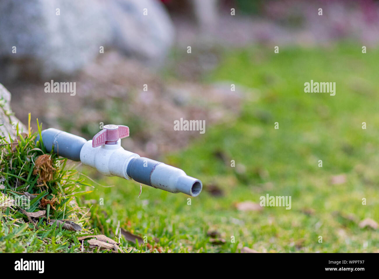 Water intake for garden irrigation Stock Photo - Alamy