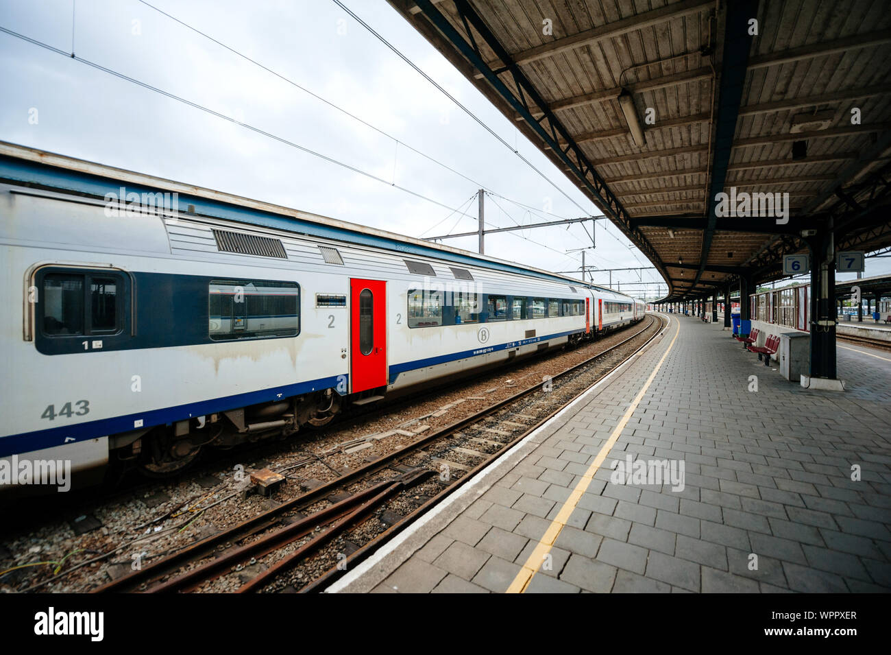 Ostend, Belgium - Jul 16, 2011: Fast long train arrival departure ...