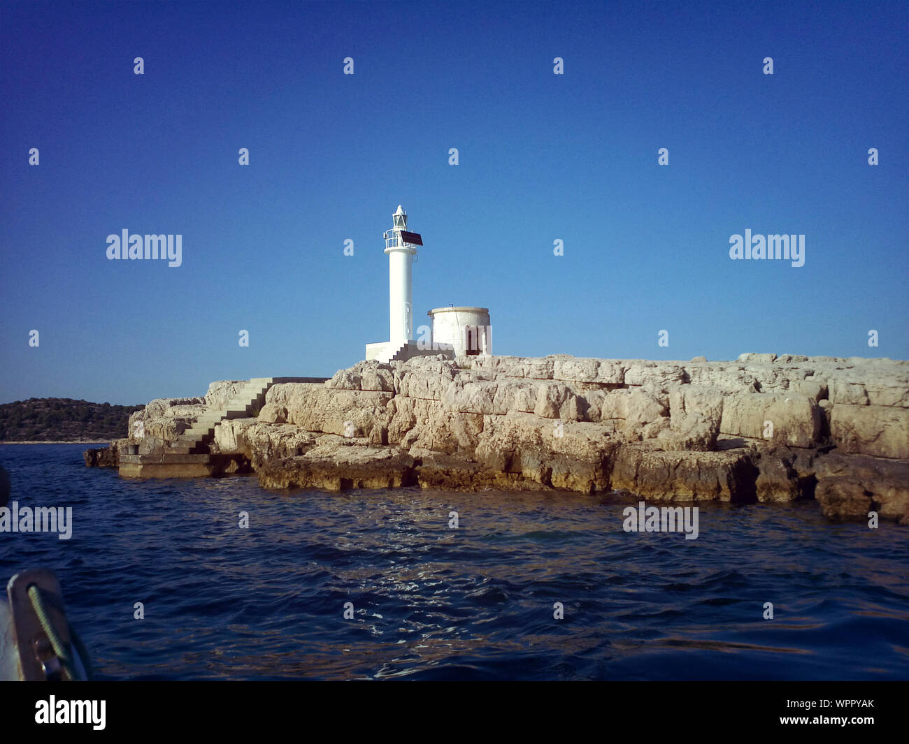 Lighthouse built on rocks hi-res stock photography and images - Alamy