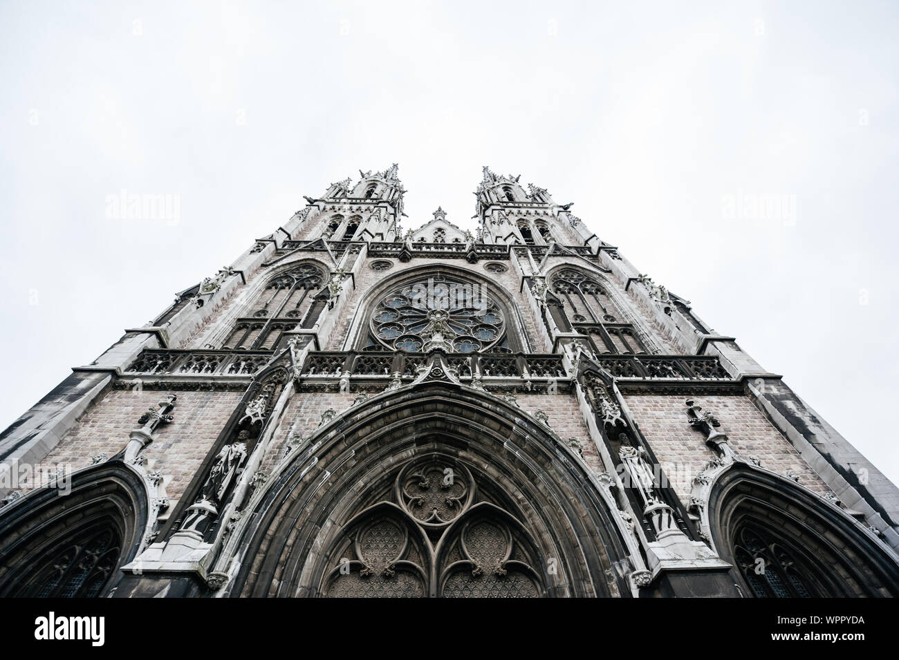 Low angle view of large facade Neo-Gothic Sint-Petrus-en-Pauluskerk the ...